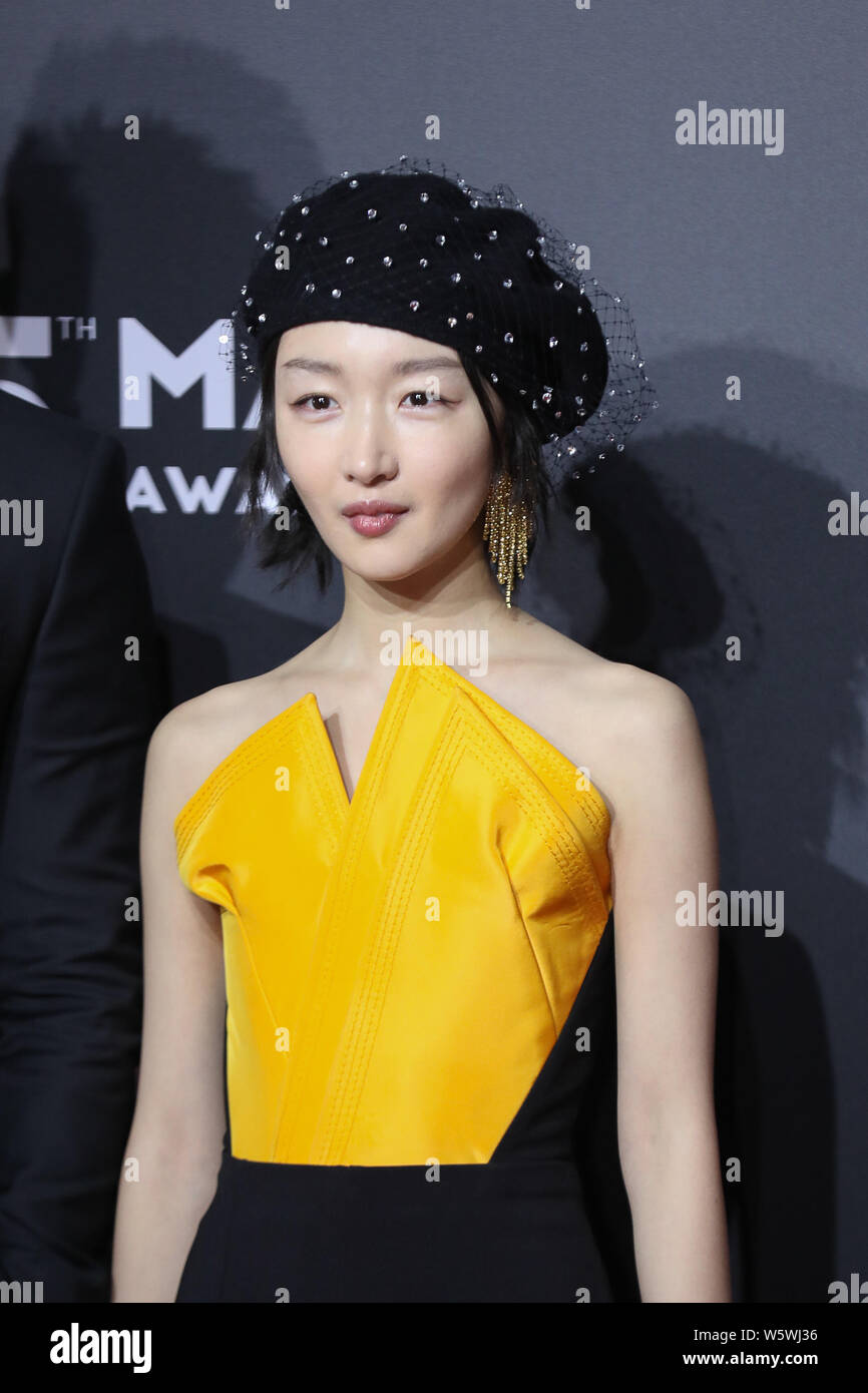 Chinese actress Zhou Dongyu poses as she arrives for the 15th Esquire ...