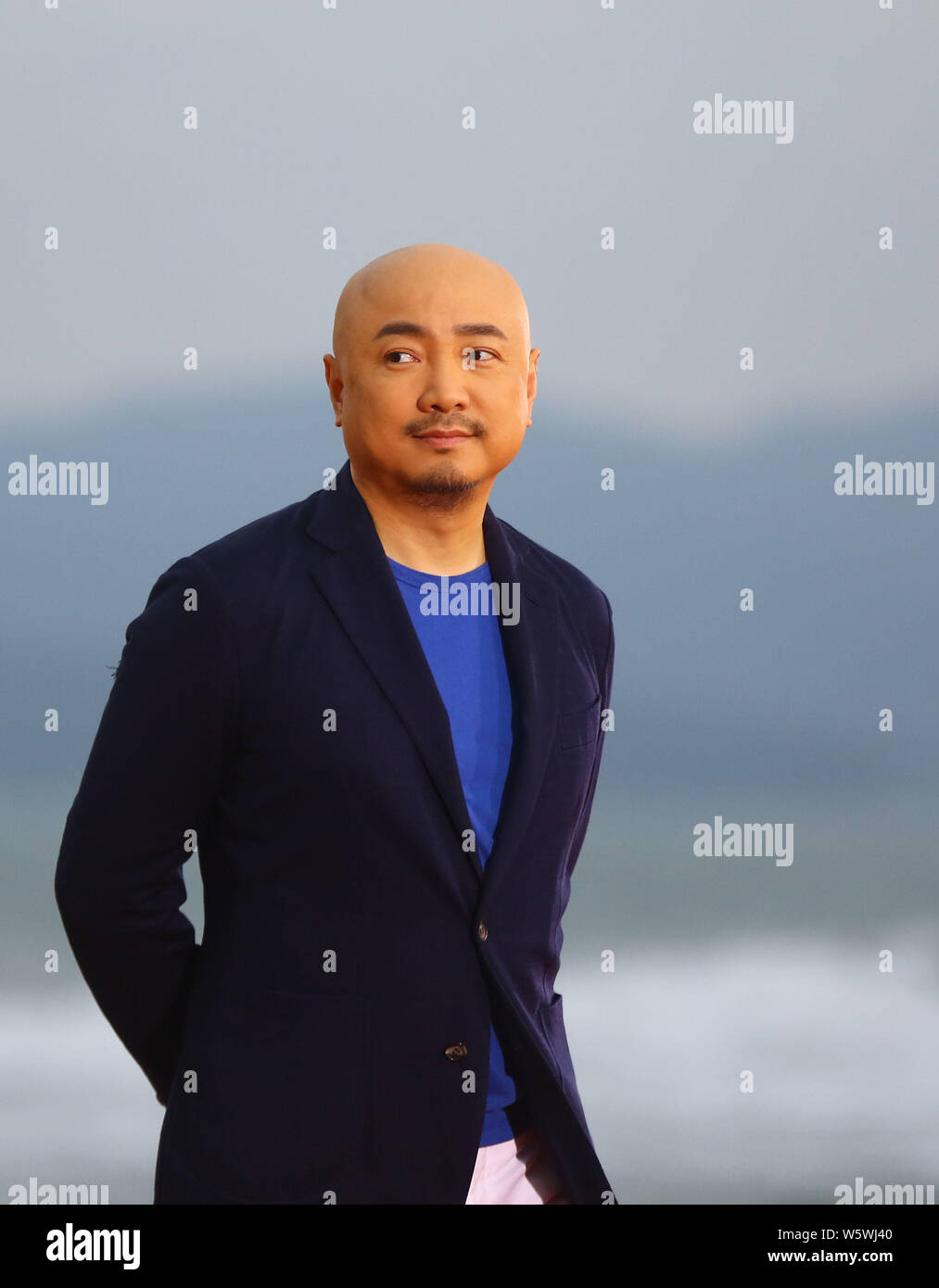 Chinese actor Xu Zheng arrives on the red carpet for the closing ...