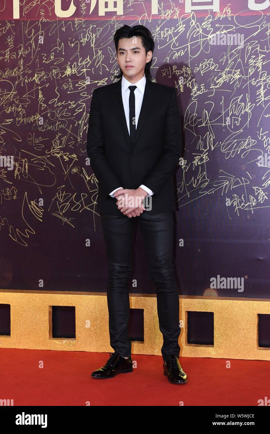 Chinese singer and actor Kris Wu or Wu Yifan poses as he arrives on the ...