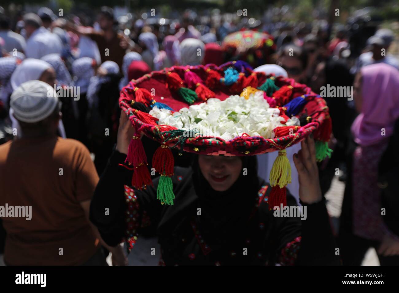 Gaza City, The Gaza Strip, Palestine. 30th July 2019. Palestinians wear ...