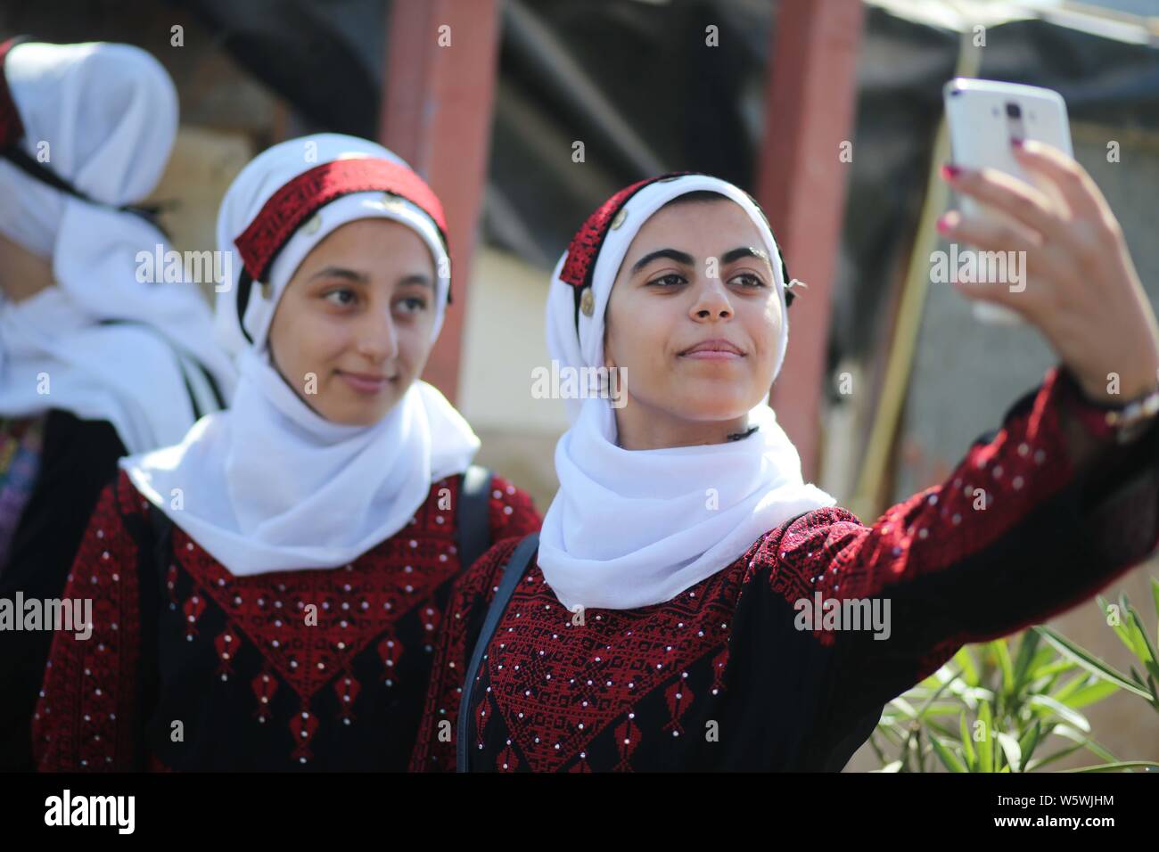 Gaza City, The Gaza Strip, Palestine. 30th July 2019. Palestinians wear ...