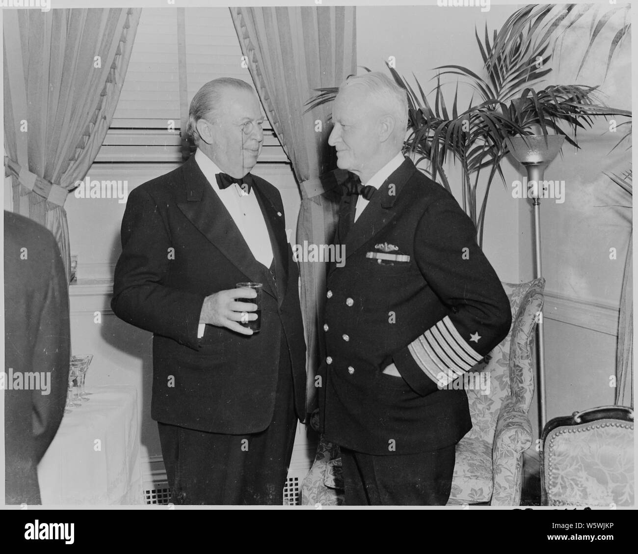 Photograph of actor Charles Coburn with Admiral Chester Nimitz at a ...