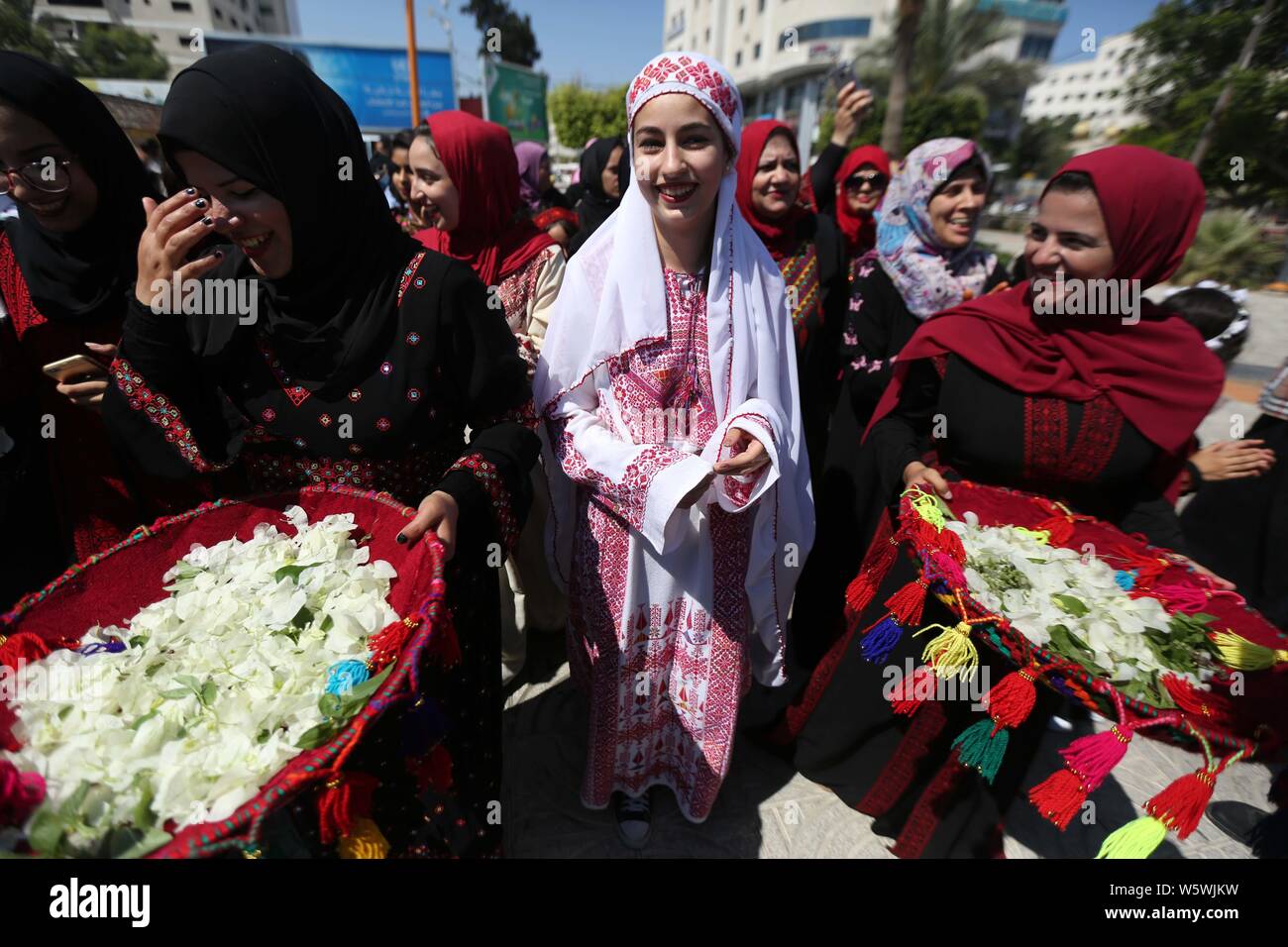 Gaza City, The Gaza Strip, Palestine. 30th July 2019. Palestinians wear ...