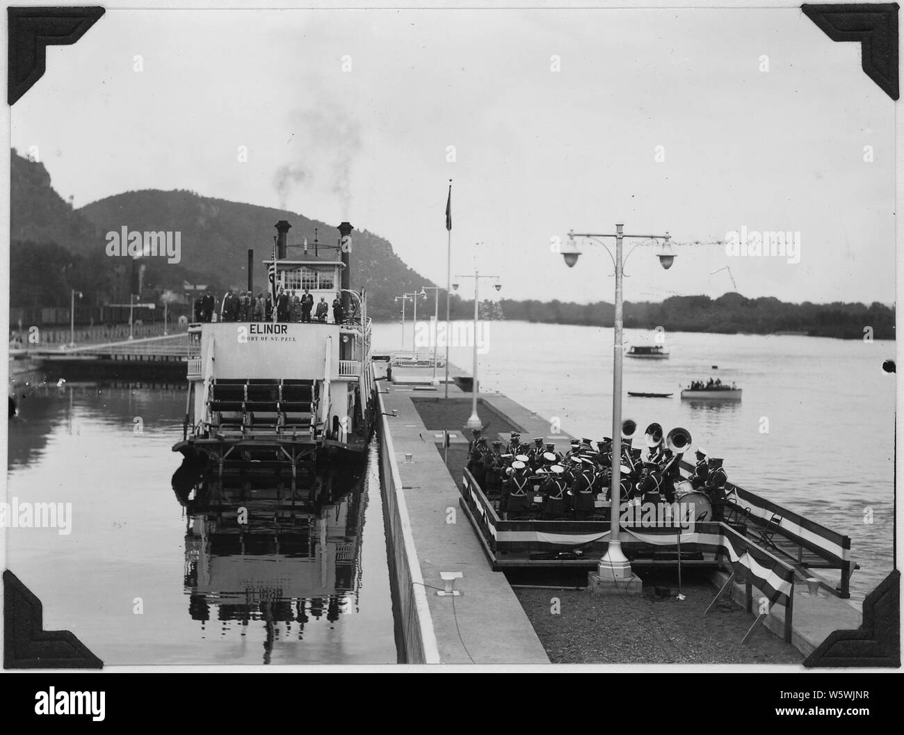 Photograph of band musicians assembled for dedication of Alma, WI dam ...