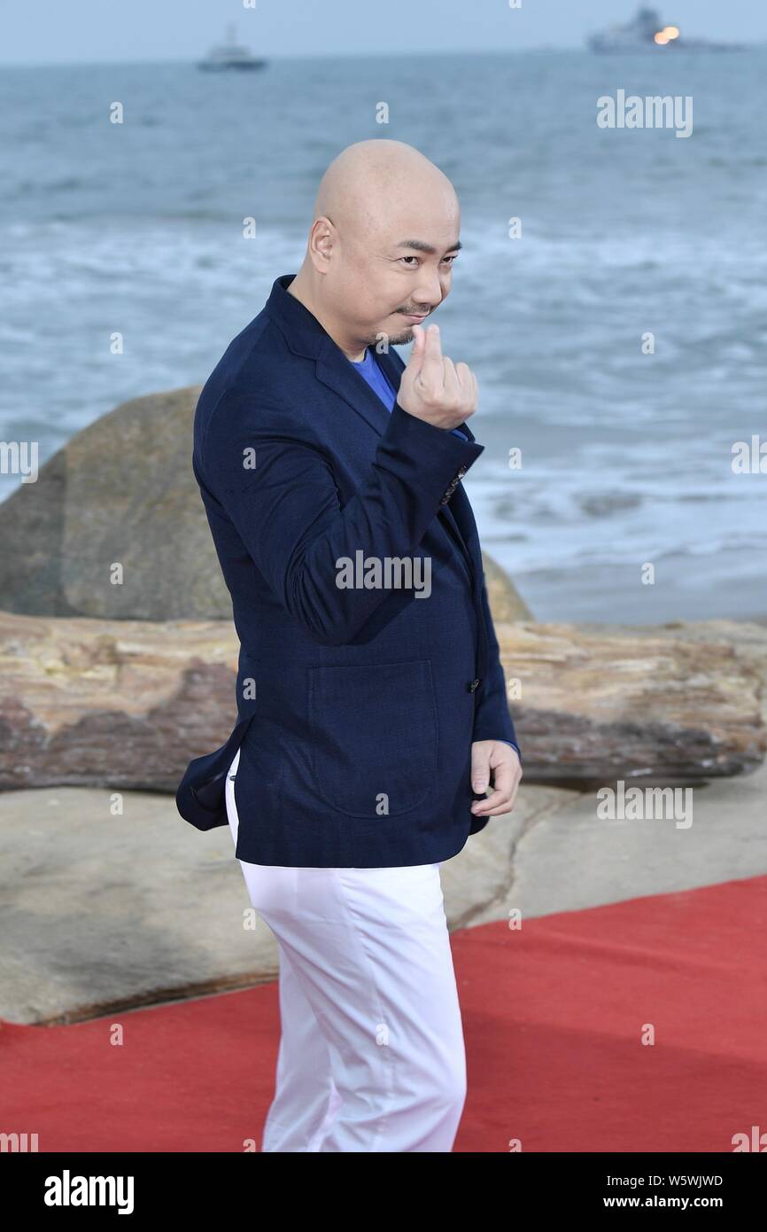 Chinese actor Xu Zheng arrives on the red carpet for the closing ...