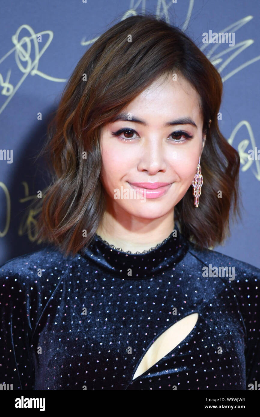 Taiwanese singer Jolin Tsai poses as she arrives on the red carpet for ...