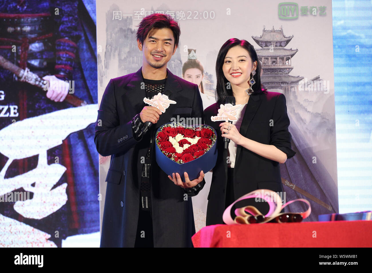 Chinese actress Jing Tian, right, and Taiwanese actor Chen Bolin attend ...