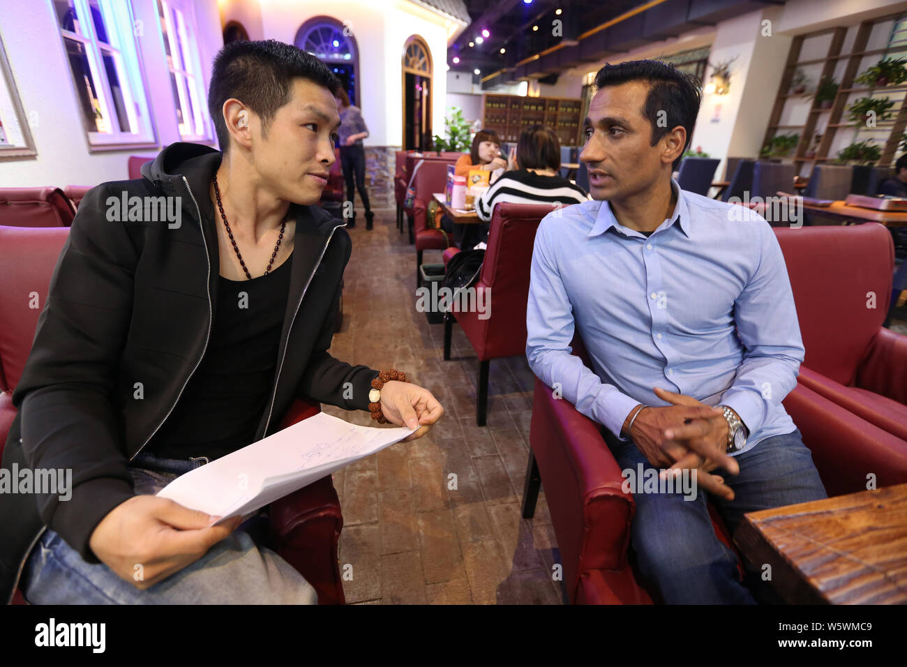 Indian man Dev Raturi, who owns eight restaurants, is pictured at his ...