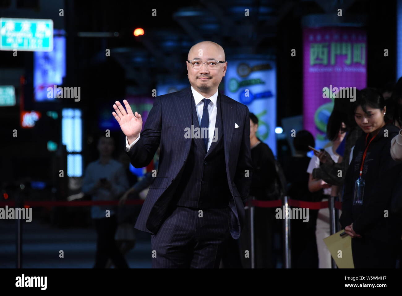Chinese actor Xu Zheng arrives on the red carpet to support his movie ...