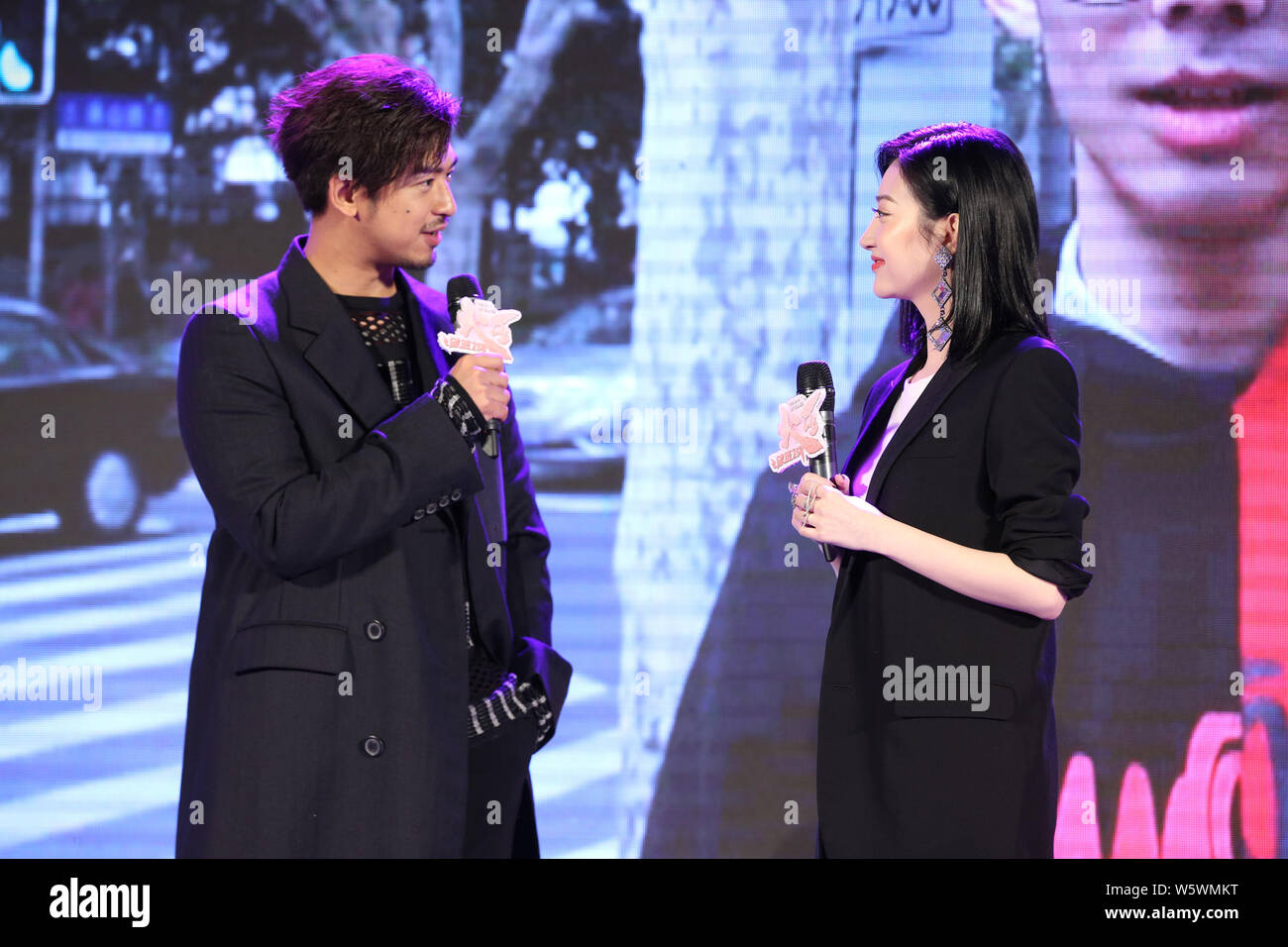 Chinese actress Jing Tian, right, and Taiwanese actor Chen Bolin attend ...