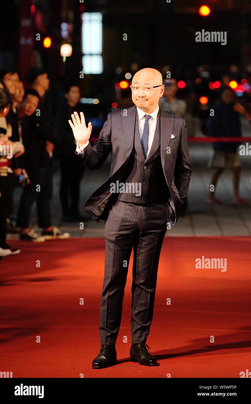 Chinese actor Xu Zheng arrives on the red carpet to support his movie ...