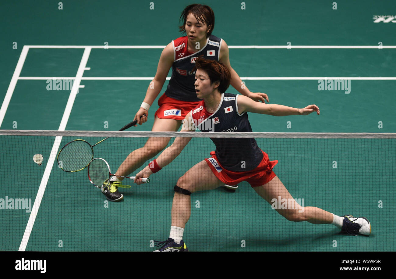 Misato Aratama and Akane Watanabe of Japan compete against Vivian Hoo ...