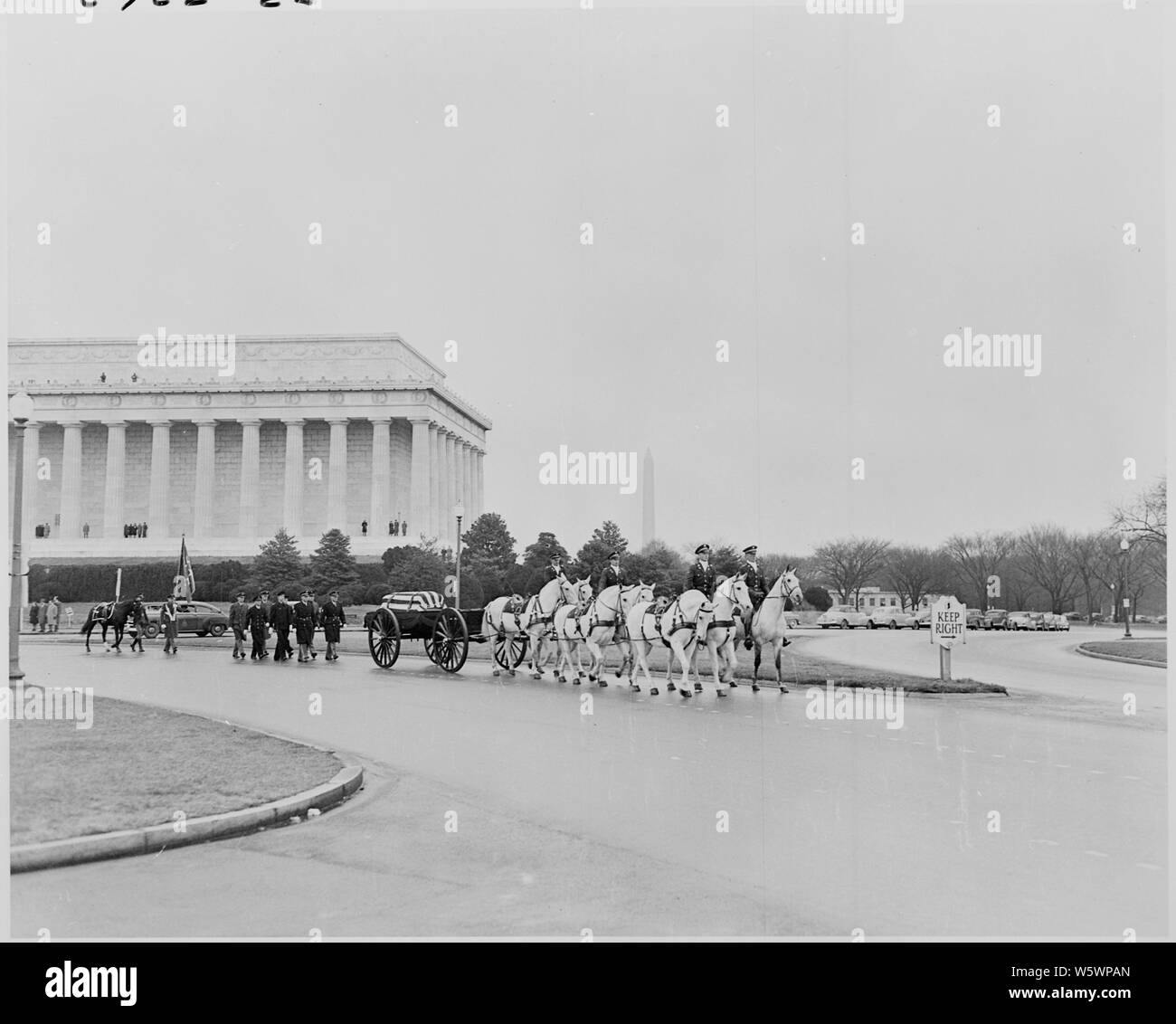 Photograph of the cortege accompanying the flag-draped casket of ...
