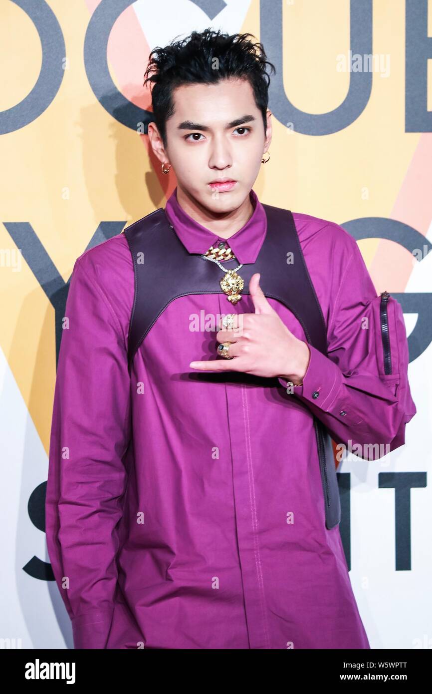 Chinese singer and actor Kris Wu or Wu Yifan arrives at the Louis ...