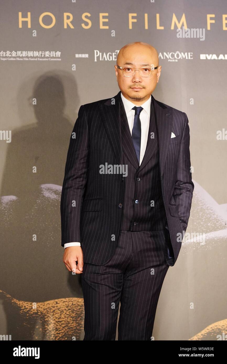 Chinese actor Xu Zheng arrives on the red carpet to support his movie ...