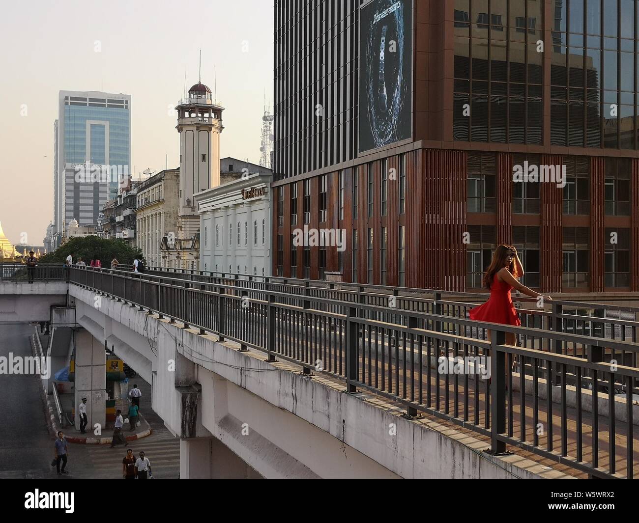 Old and modern buildings on streets of Yangon, the former burmese ...