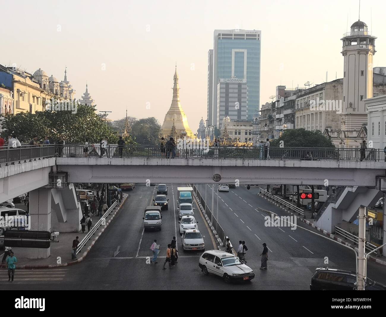 Old and modern buildings on streets of Yangon, the former burmese ...