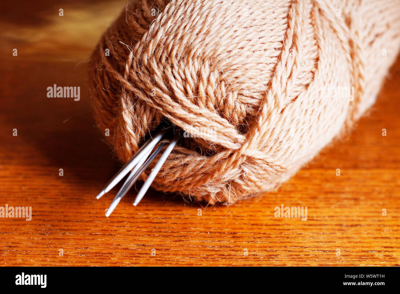 Skein thread and knitting needles. Knit. Needlework. Knitting needles ...