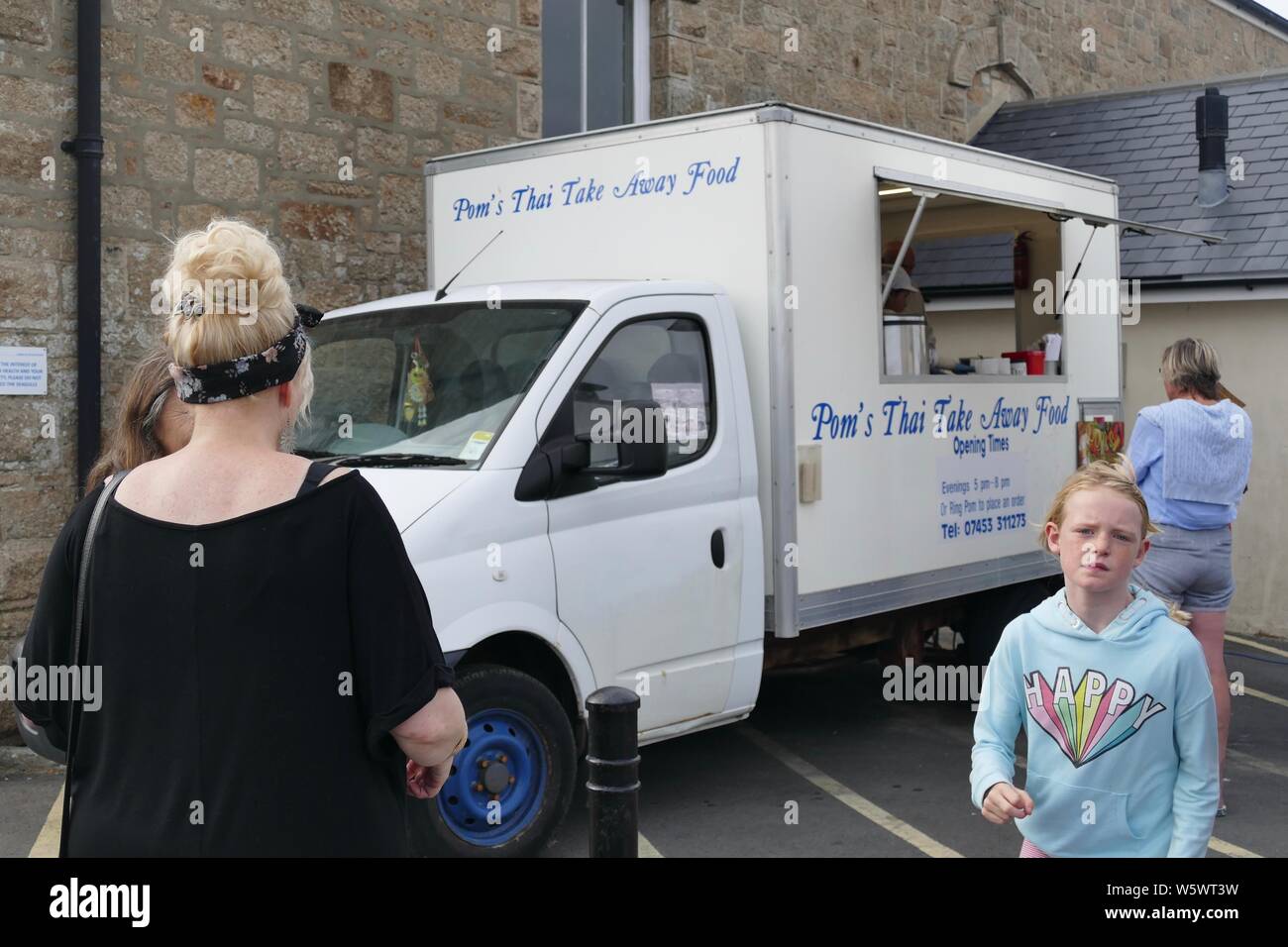 People waiting for take away food Stock Photo - Alamy