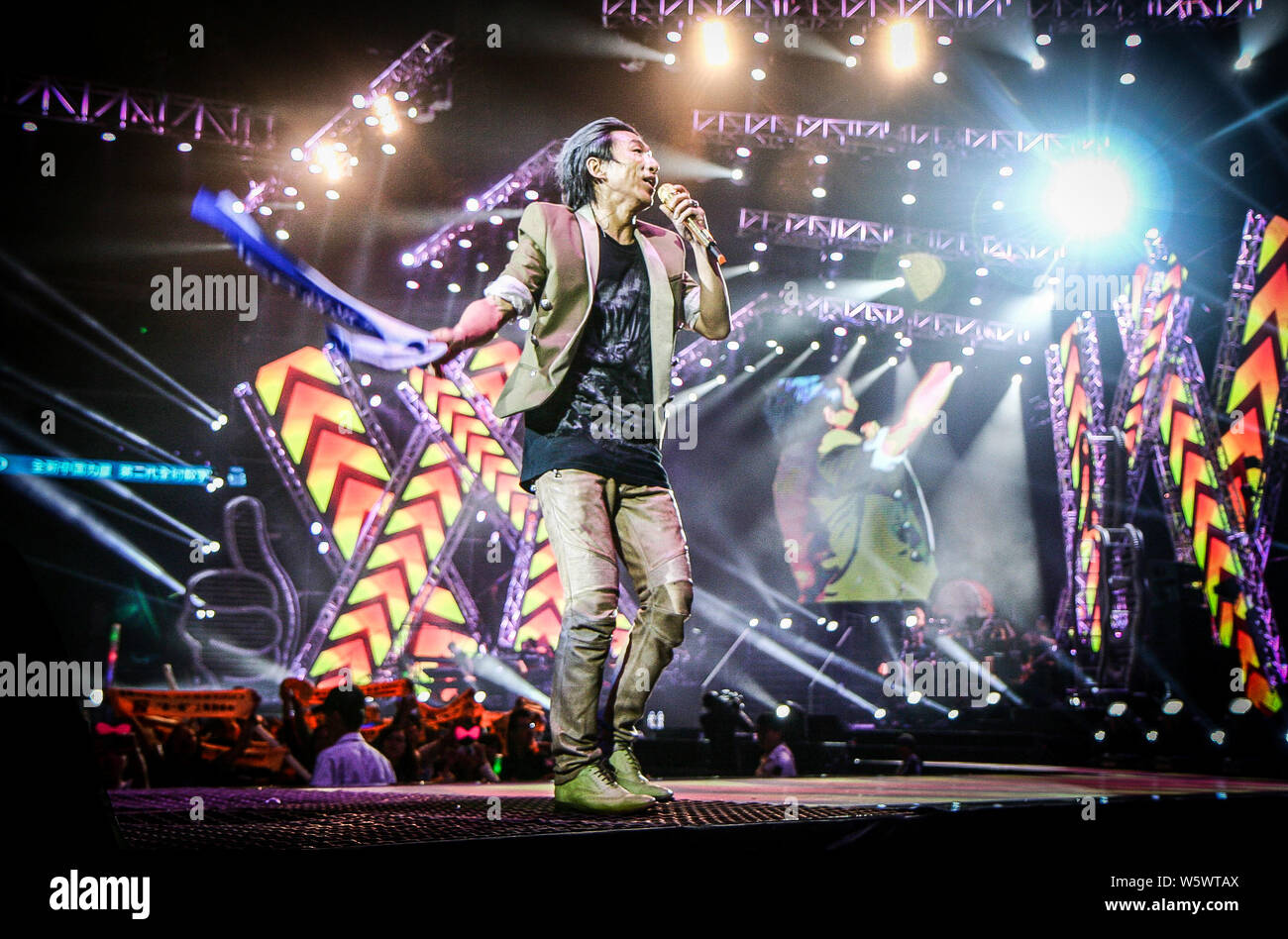 --FILE--Singer and actor Chen Yufan of Chinese pop duo Yu Quan performs ...