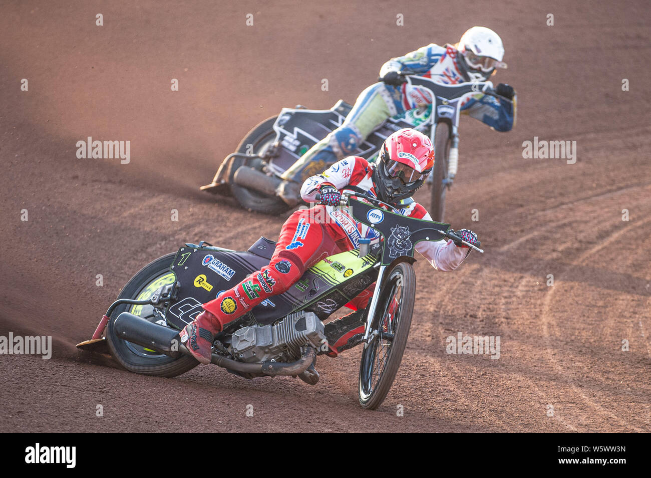 Manchester, England. 29th July 2019 Craig Cook (Red) leads Richard ...
