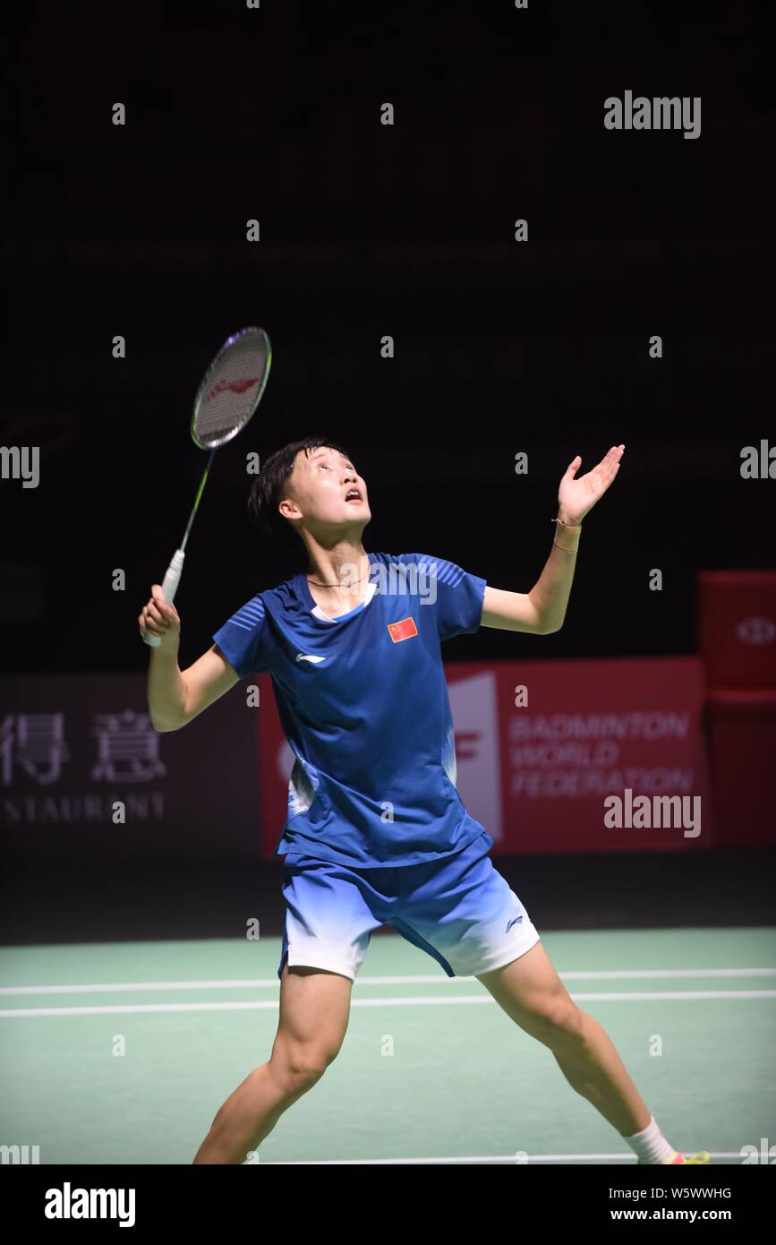 Chen Yufei of China returns a shot to Nozomi Okuhara of Japan in the ...