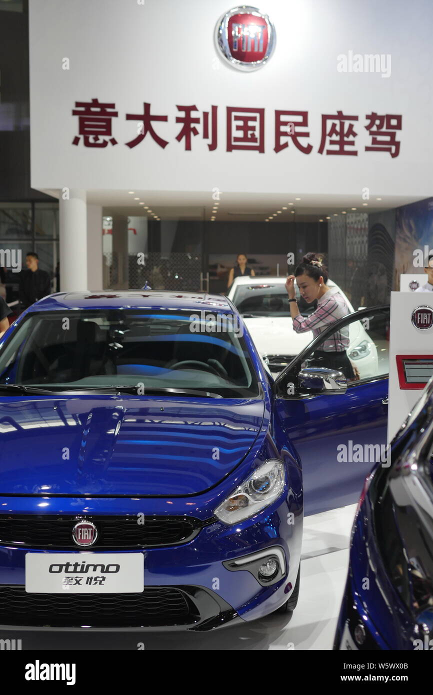 --FILE--People visit the stand of Jeep of GAC Fiat Chrysler, a joint ...
