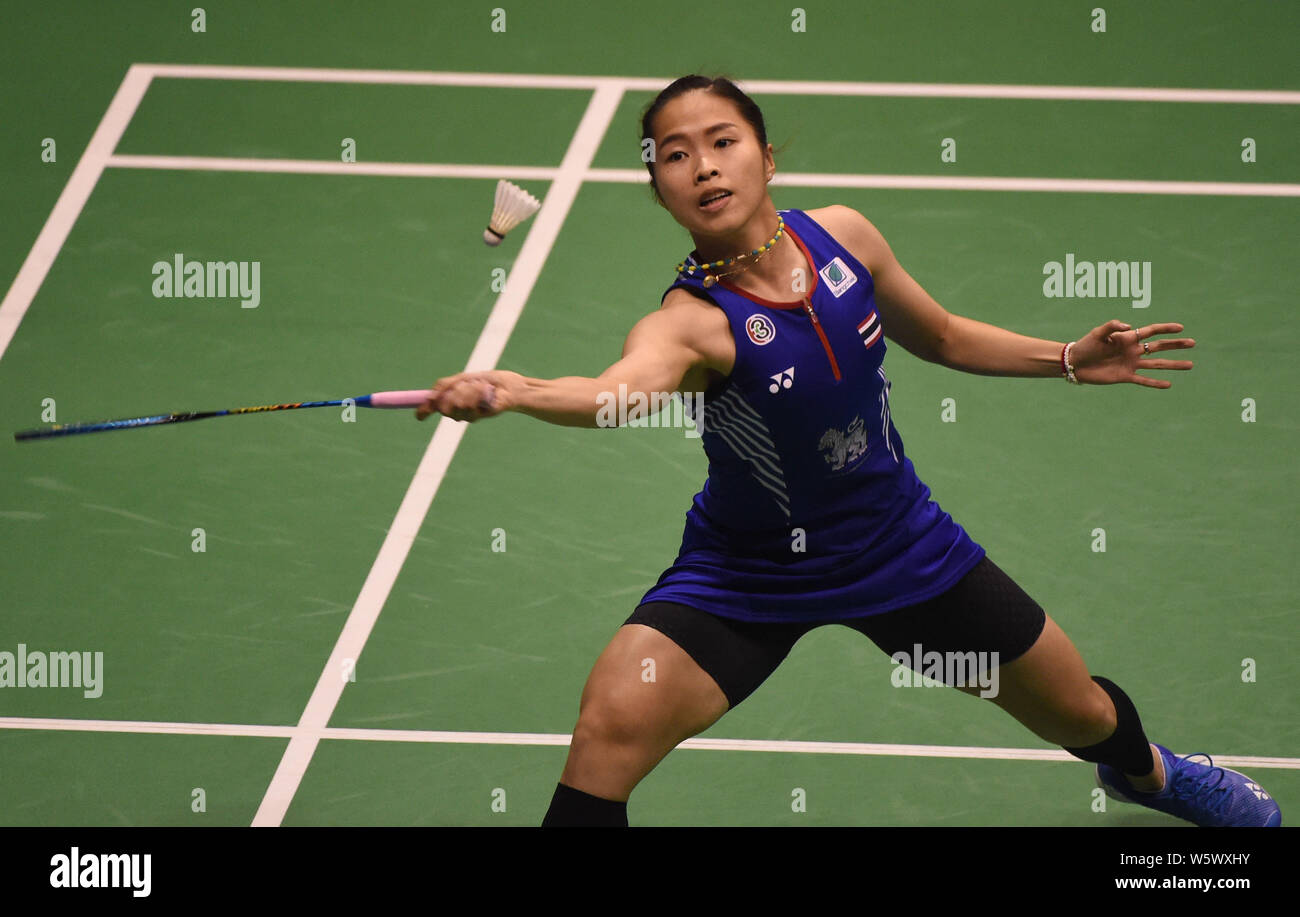 Ratchanok Intanon of Thailand returns a shot to Sung Ji-hyun of South ...