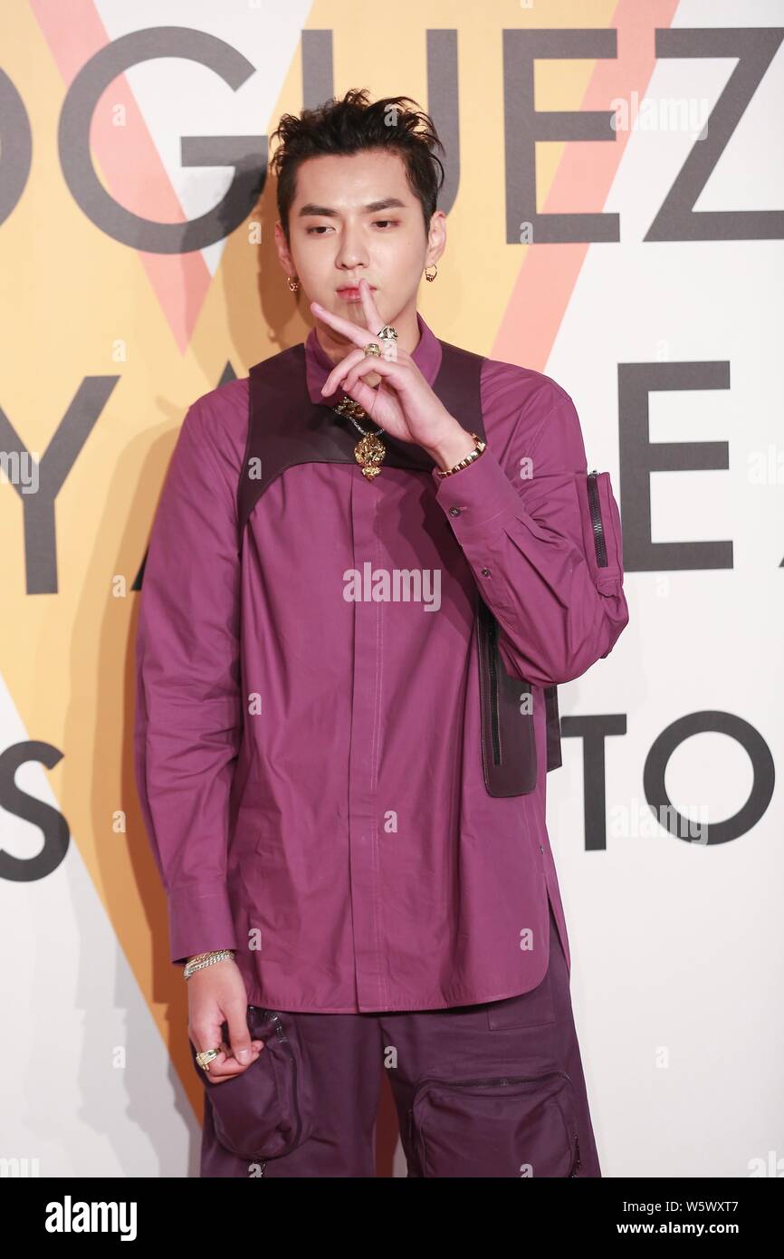 Chinese singer and actor Kris Wu or Wu Yifan arrives at the Louis ...