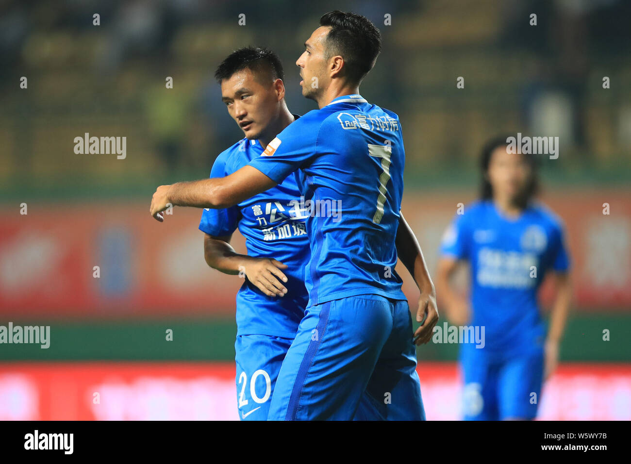 Israeli football player Eran Zahavi of Guangzhou R&F, right, celebrates ...