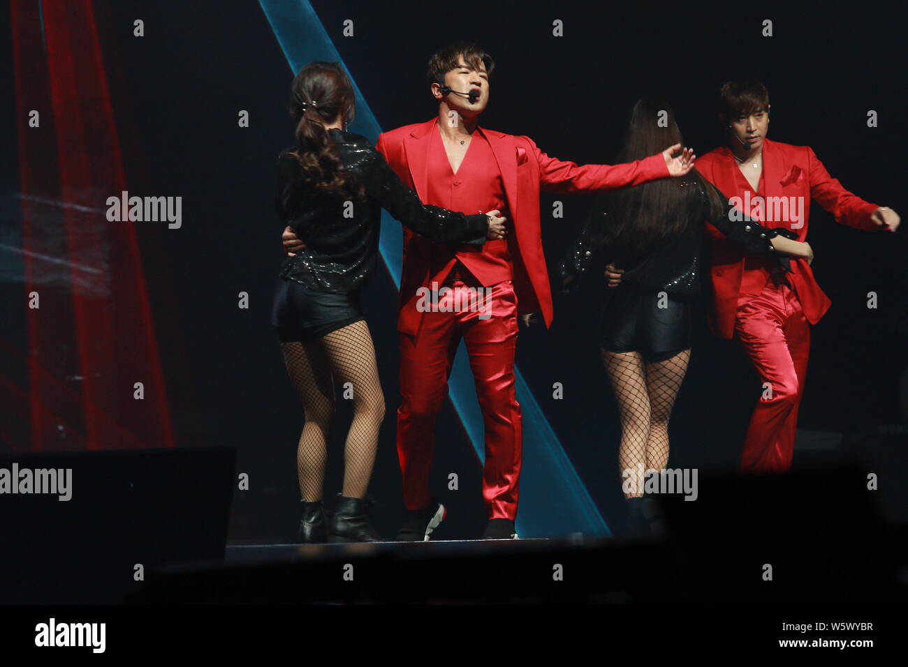 Members of South Korean boy band Shinhwa perform during the 2018 ...