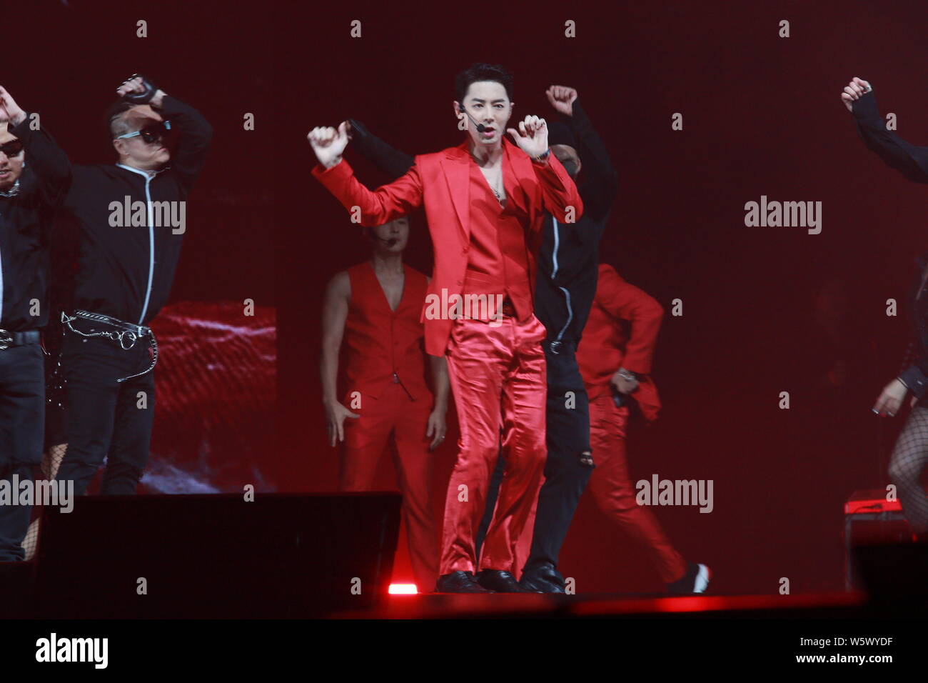 Members of South Korean boy band Shinhwa perform during the 2018 ...