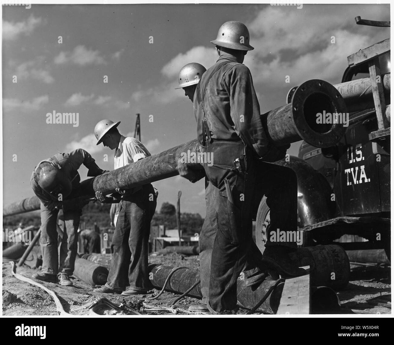 Pipe fitters lay a new line at Tennessee Valley Authority Fort Loudon ...