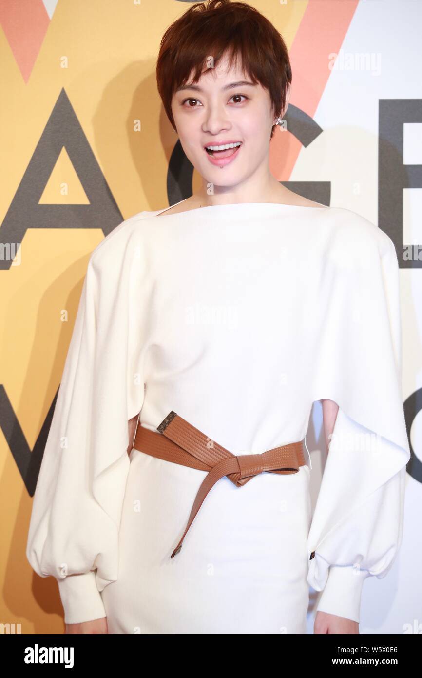 Chinese actress Sun Li poses as she attends the Louis Vuitton "Volez ...