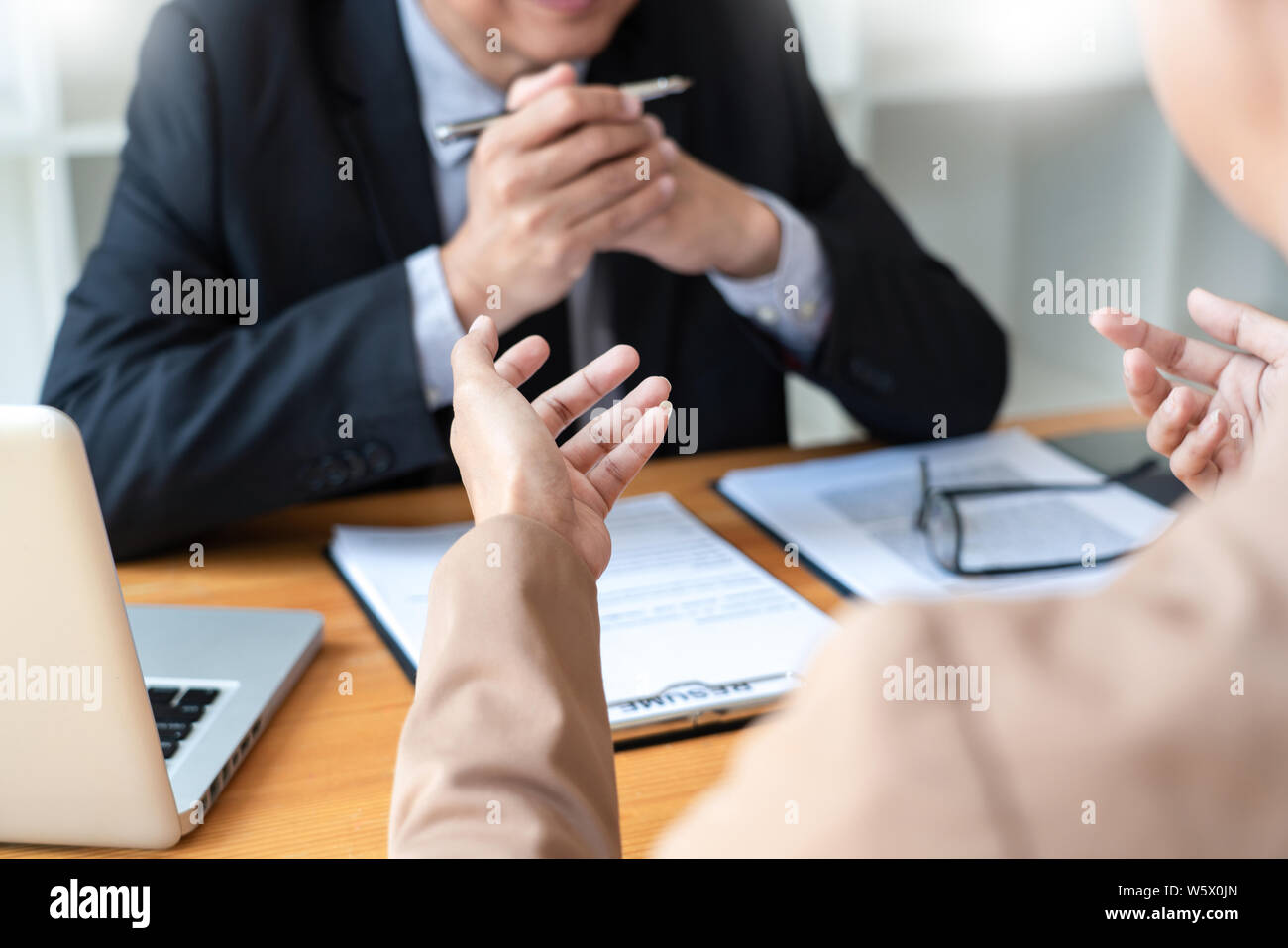 businessman candidate explaining about his profile and conducting a job ...