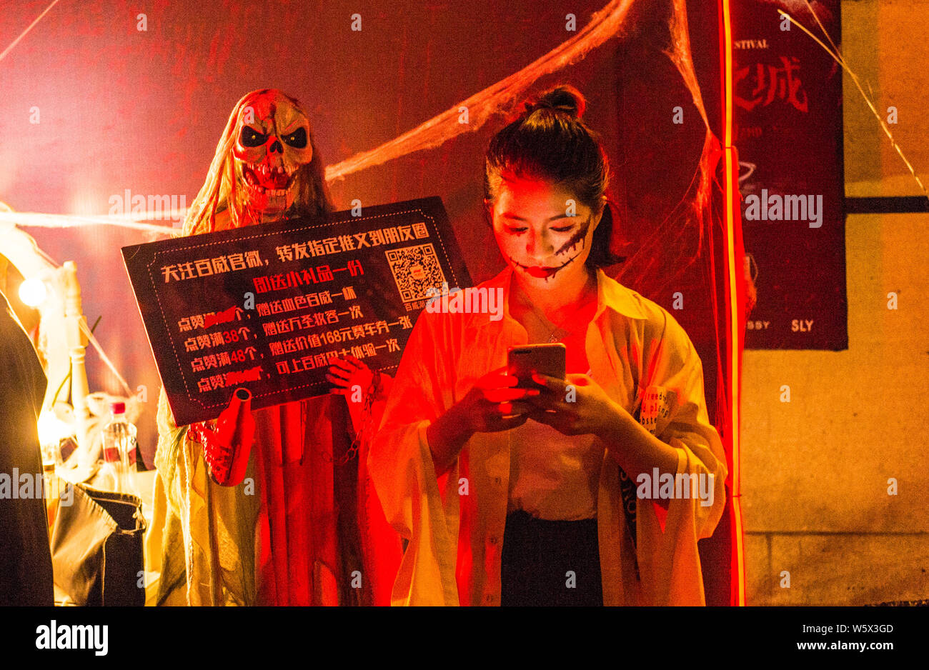 Young Chinese people wearing zombie and demon costumes and makeups take ...