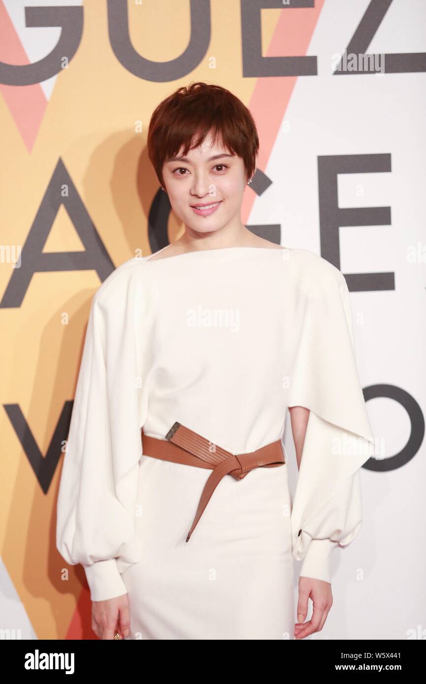 Chinese actress Sun Li poses as she attends the Louis Vuitton "Volez ...