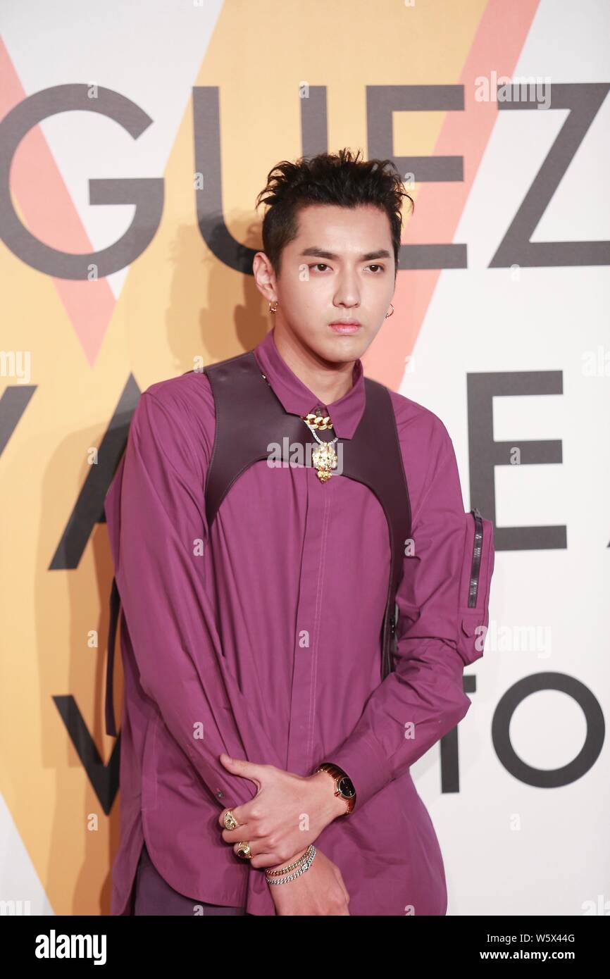 Chinese singer and actor Kris Wu or Wu Yifan arrives at the Louis ...
