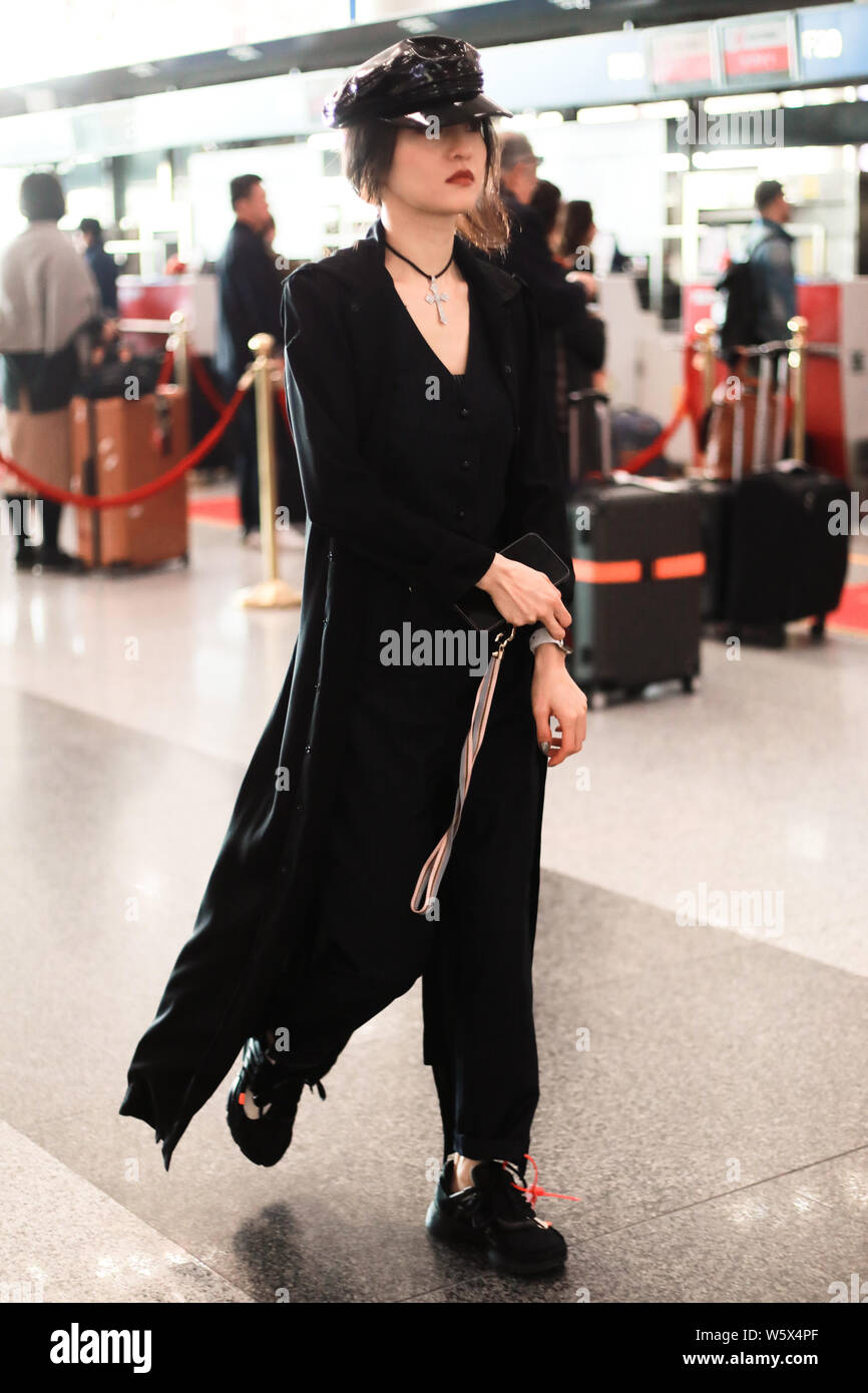 Taiwanese singer and actress Angela Chang arrives at an airport before ...