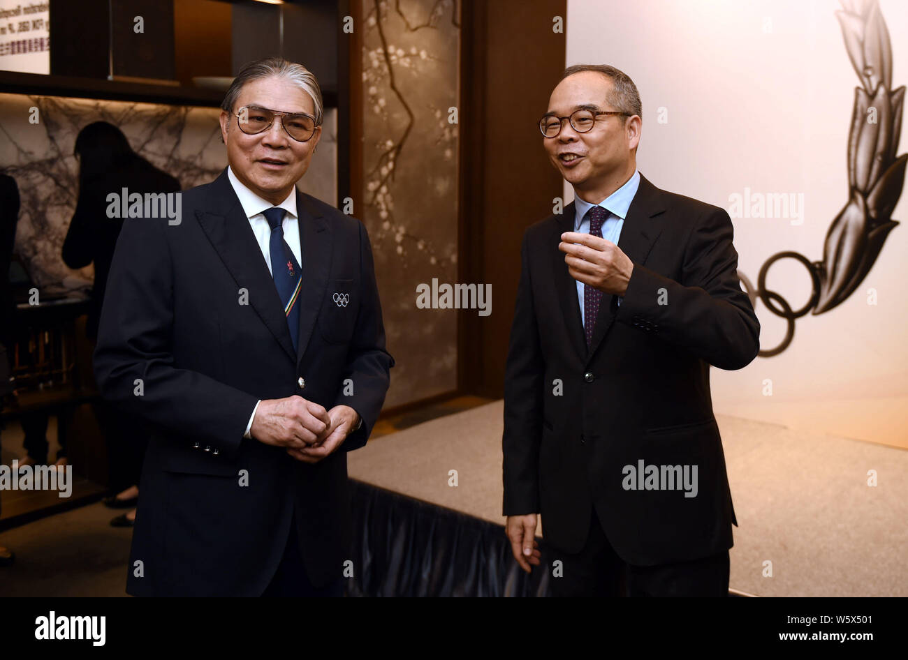 Hong Kong tycoon Timothy Fok Tsun-Ting, left, attends the celebration ...