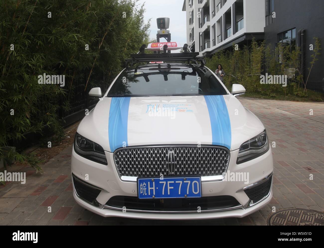 China's first self-driving taxi developed by Guangzhou major public ...