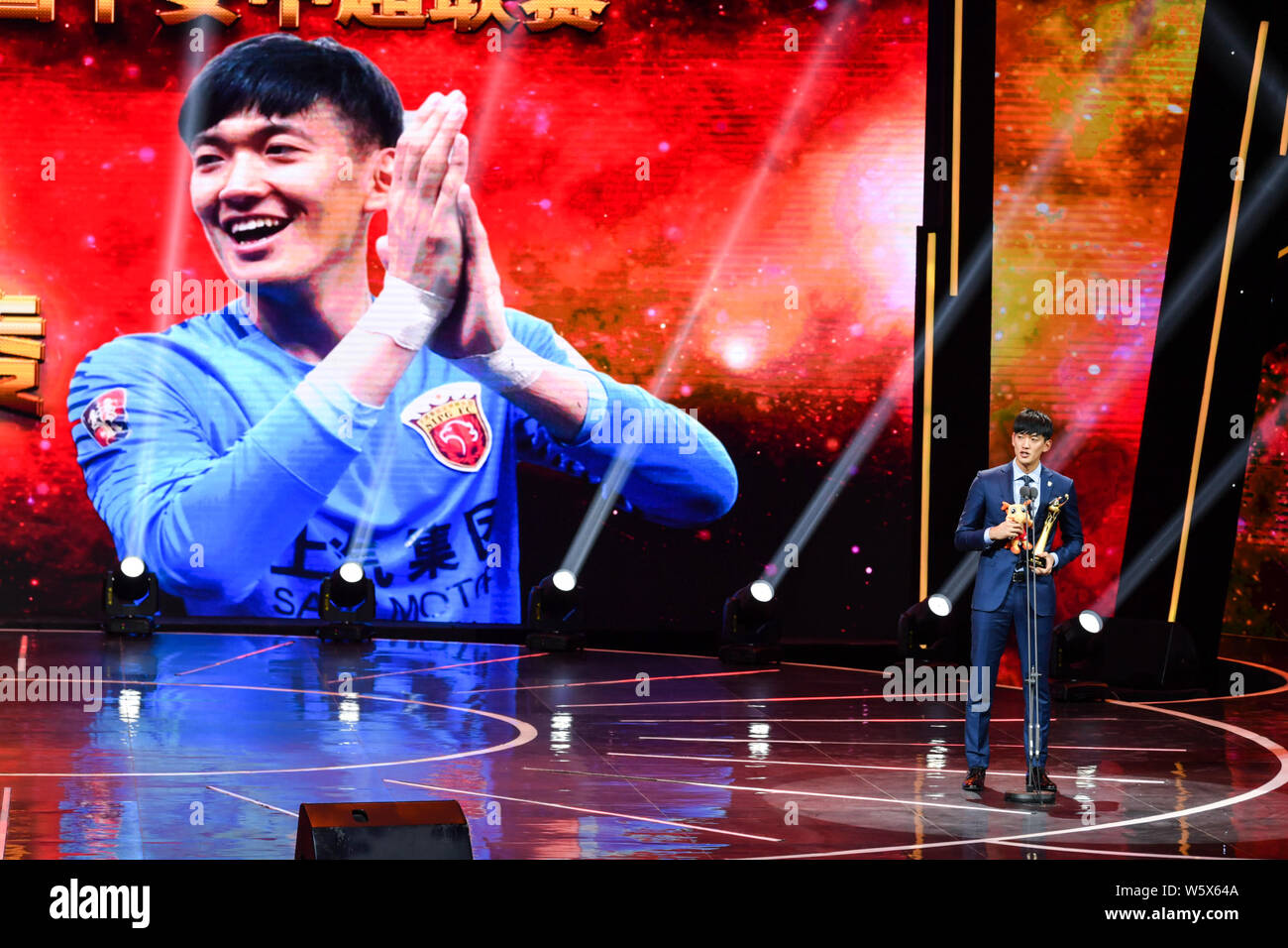 Chinese football player Yan Junling of Shanghai SIPG poses with his ...