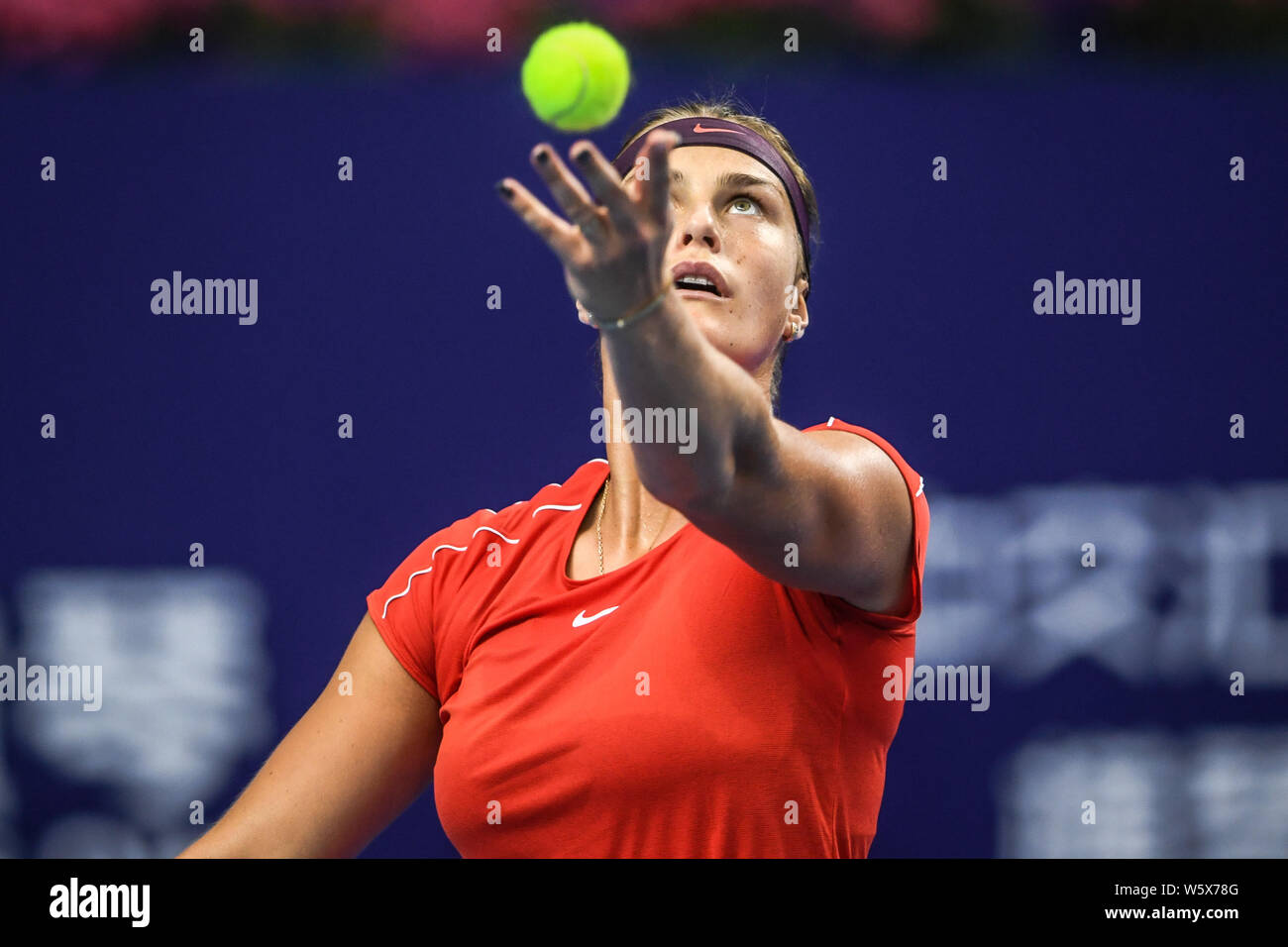 Aryna Sabalenka of Belarus serves against Caroline Garcia of France in ...