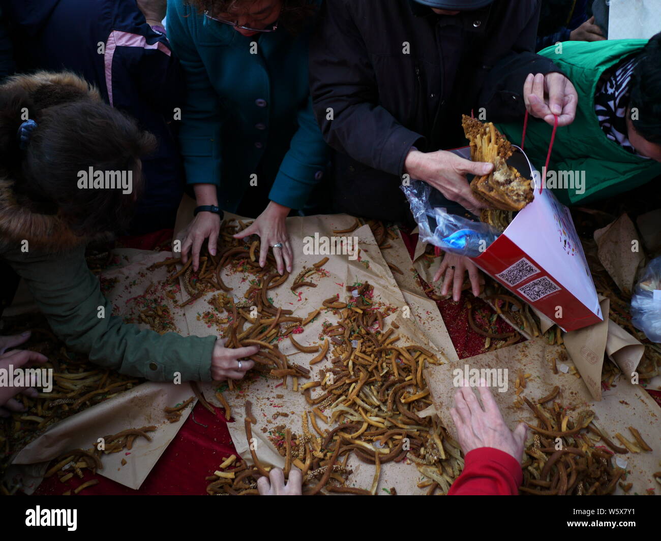 A giant traditional fried dough twisty snack Mahua weighing 59kg is on ...