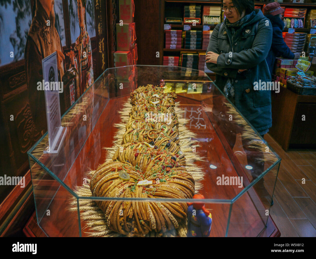 A giant traditional fried dough twisty snack Mahua weighing 59kg is on ...