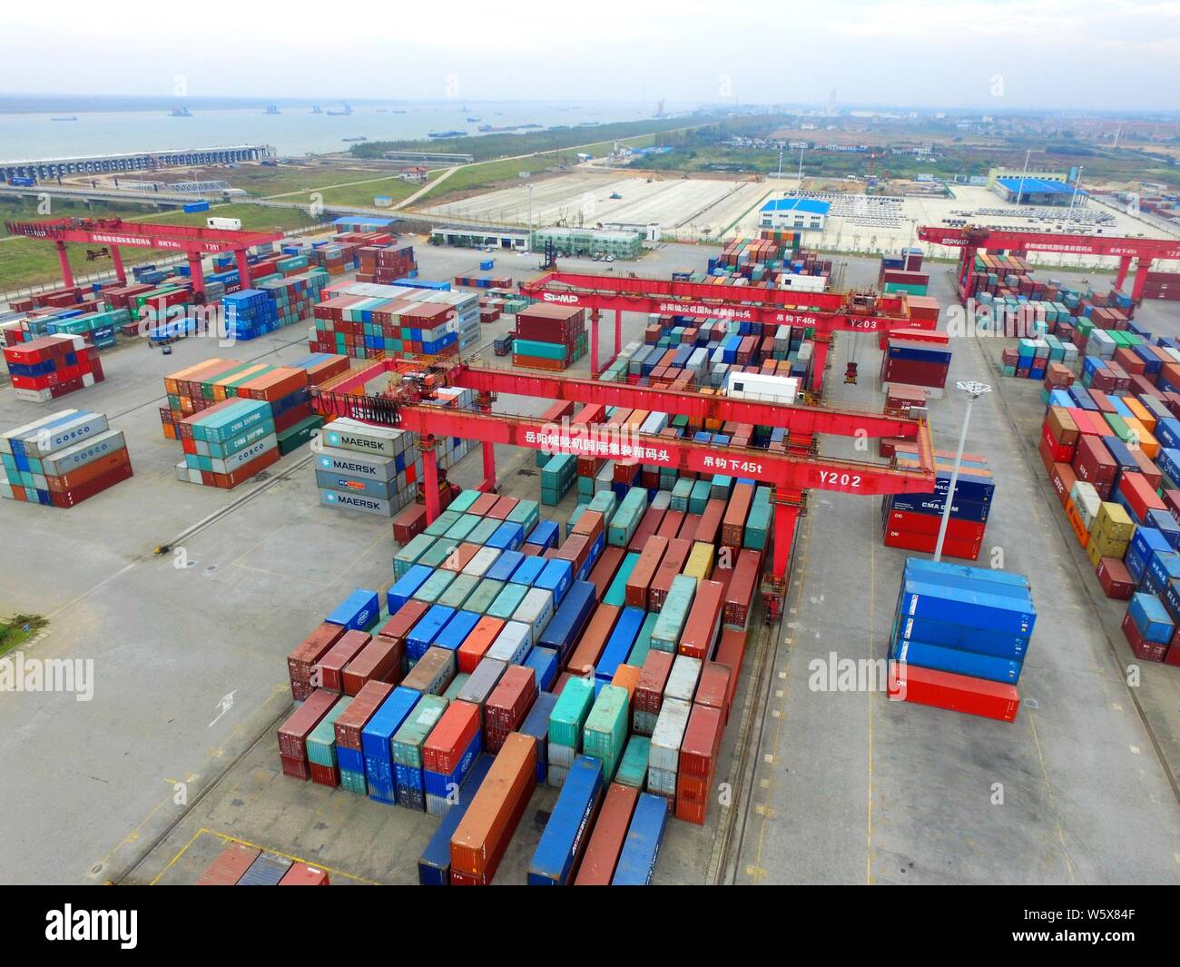 An aerial view of containers stacked at the fully automated container terminal at the Port of ...