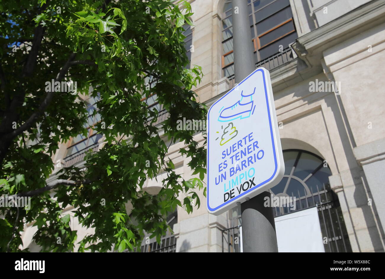 Pet poop waring sign Madrid Spain Stock Photo - Alamy
