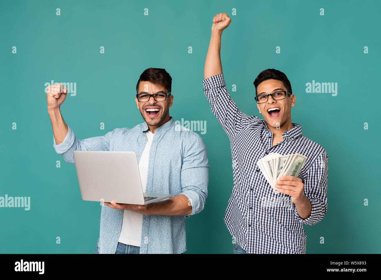 Two Gladful Men Holding Money And Laptop Rejoicing Success Stock Photo ...