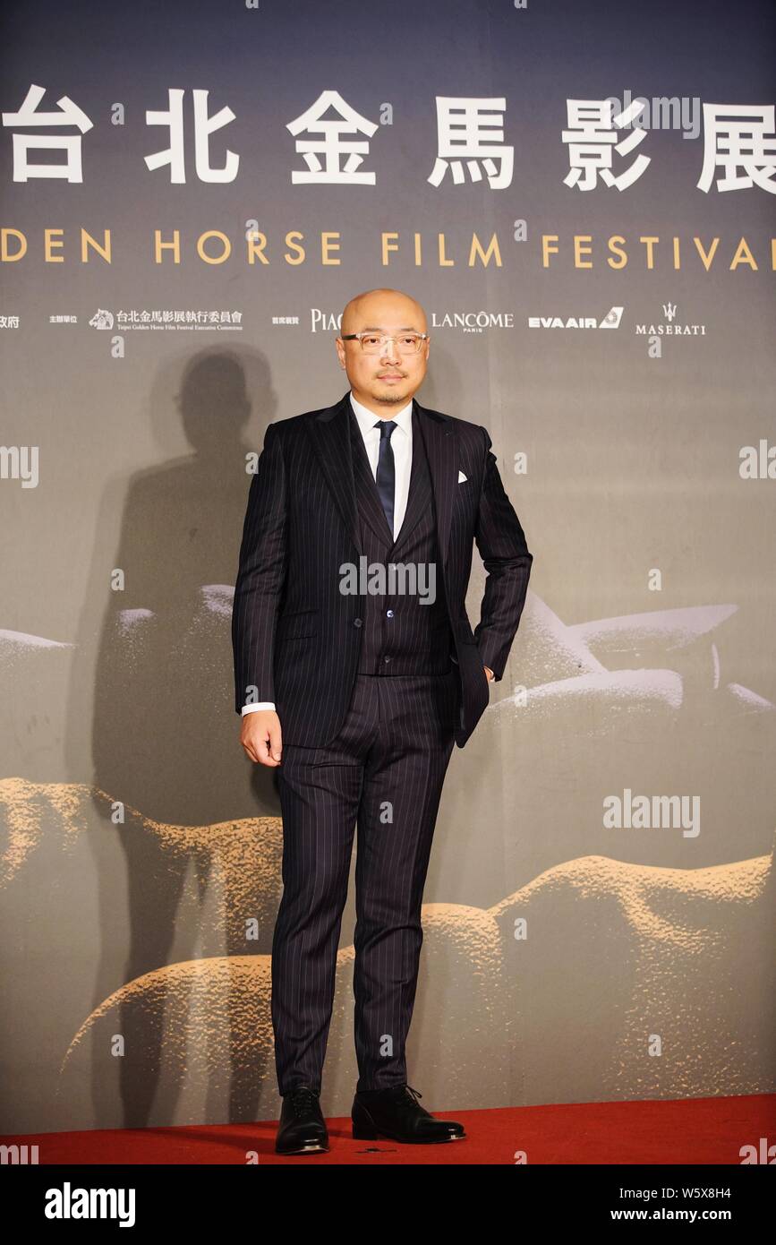 Chinese actor Xu Zheng arrives on the red carpet to support his movie ...