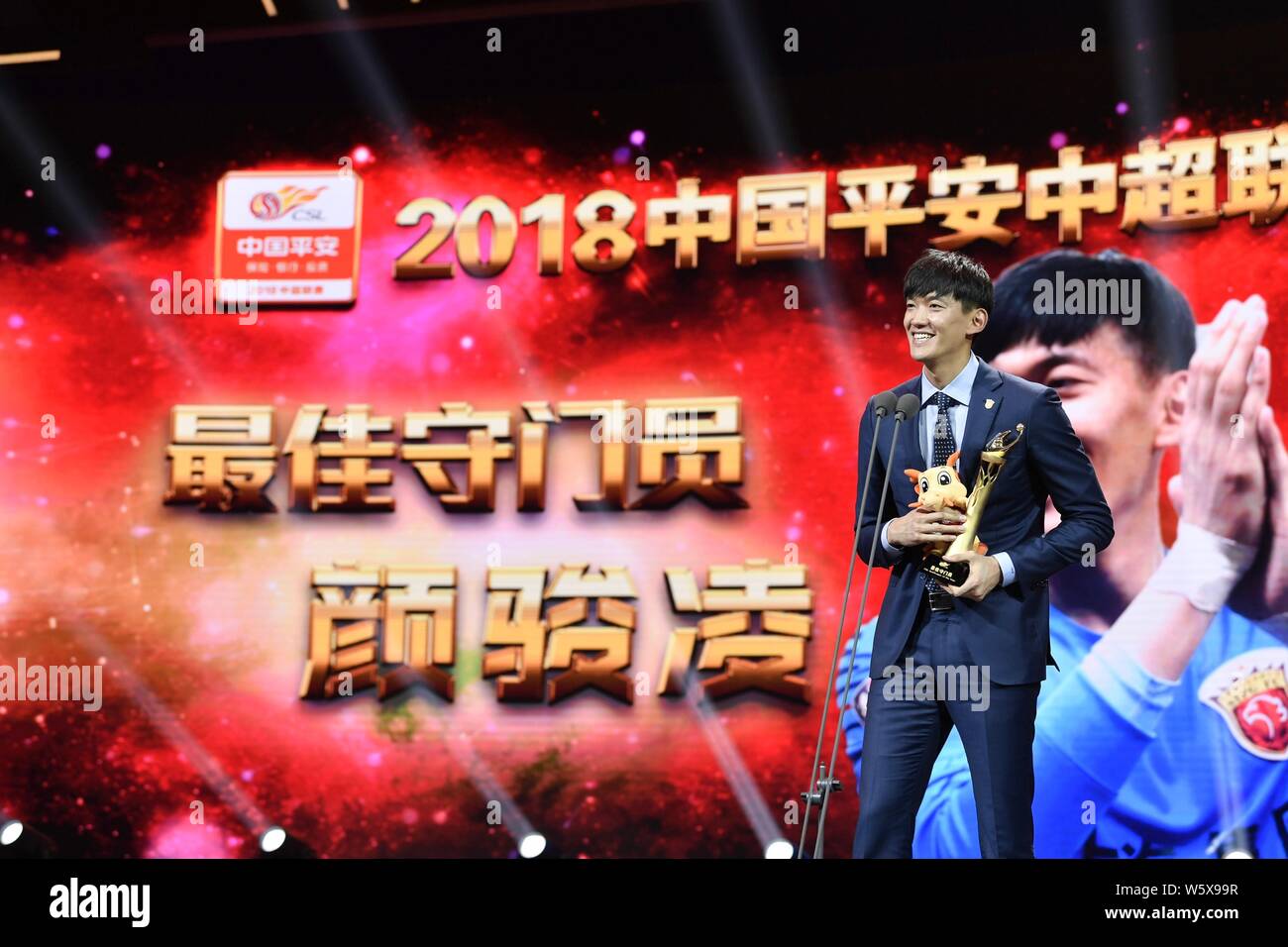 Chinese football player Yan Junling of Shanghai SIPG poses with his ...